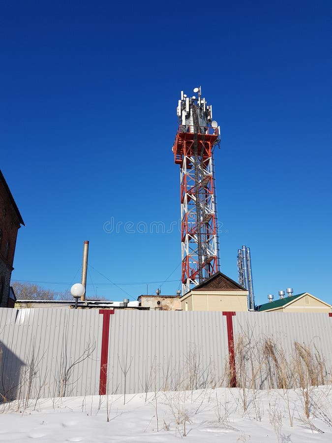 Cell Tower Stands Behind the Fence Stock Image - Image of pipe, fence ...