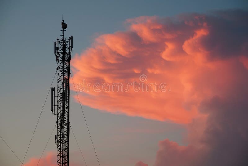 Cell Tower and Big Orange Sunset Clouds Stock Photo - Image of internet ...