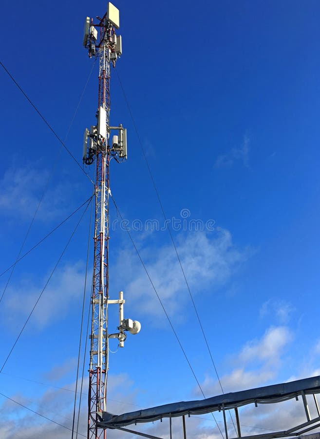 Cell Tower on the Roof of the Building Stock Image - Image of ...