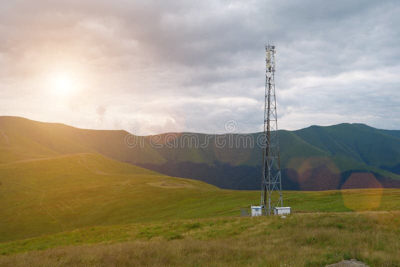 Cell Tower and Storm Clouds in the Mountains Stock Photo - Image of ...