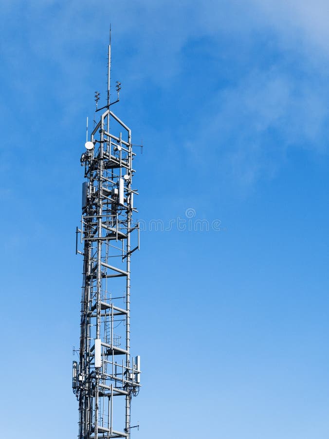 Cell Tower UK with Copy Space Against a Blue Sky Stock Image - Image of ...