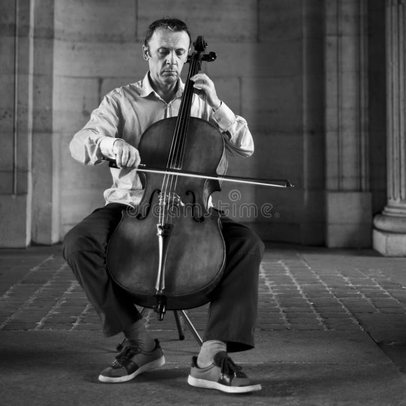 Cellist in Paris editorial image. Image of february, street - 52234855