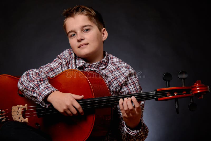 Cellist stock image. Image of indoor, modern, musical - 62405061