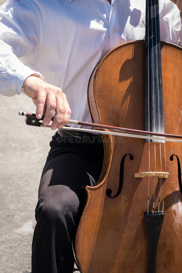 Cello Street musician stock image. Image of performance - 57492259