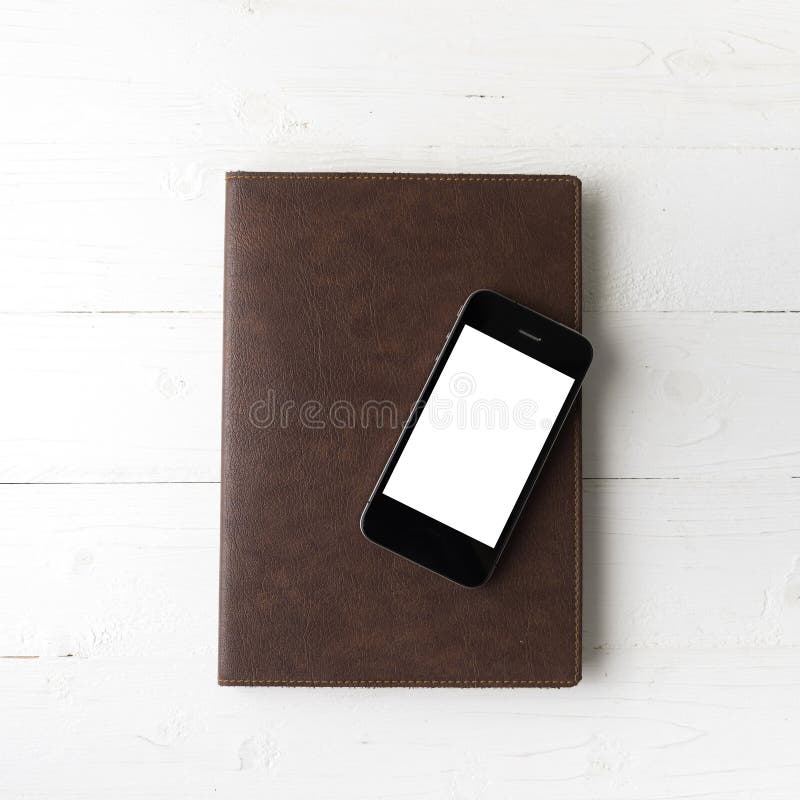 Cellphone and notebook stock photo. Image of space, technology - 61048204