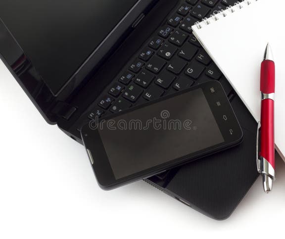 Cellphone and Notepad on Laptop Stock Photo - Image of personal, gadget ...