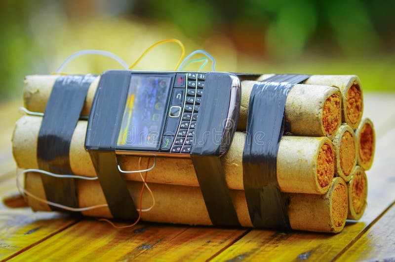 Cellphone Tied To a Terrorist Bomb Laying on the Ground Stock Image ...