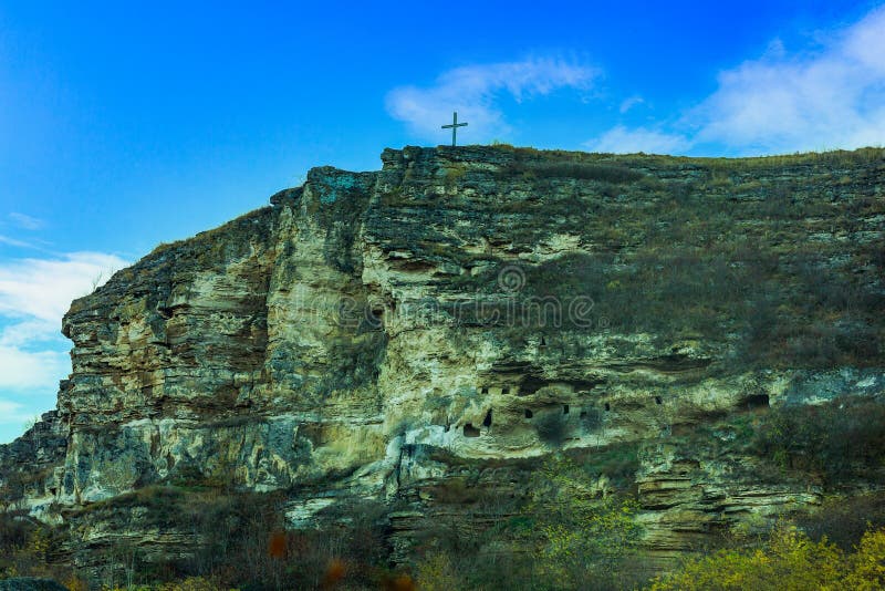 Cells of Monks in a Rocky Monastery. Background with Copy Space for ...