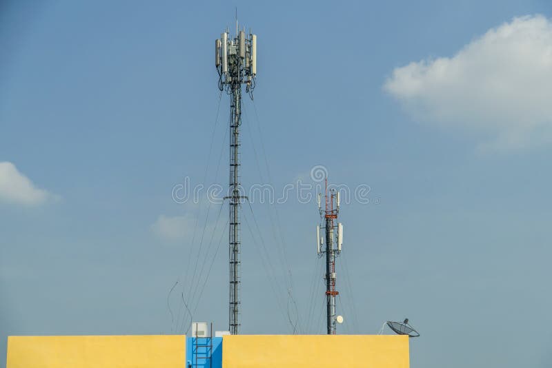 Cellular Phone Towers are on the Rooftop of the Building. Stock Image ...