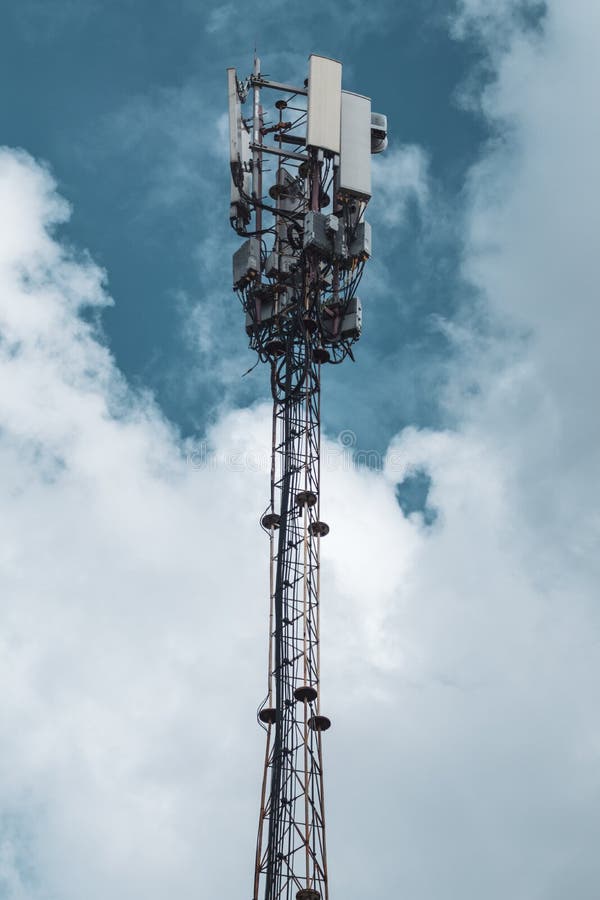 Cellular Tower with Antennas on Epic Cloudscape Stock Image - Image of ...