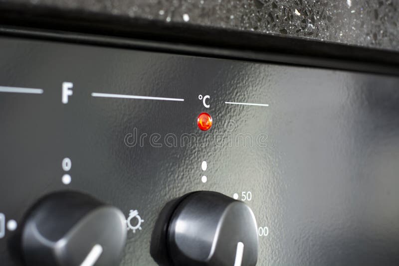 Celsius with Red Indicator Light. Heating Up the Oven in Kitchen Stock ...