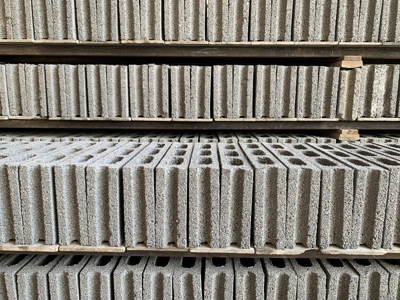 Set of Concrete Lined Up Stack in Warehouse Background Stock Photo ...