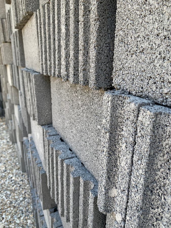 Set of Concrete Brick Lined Up Stack in Warehouse Background Stock ...