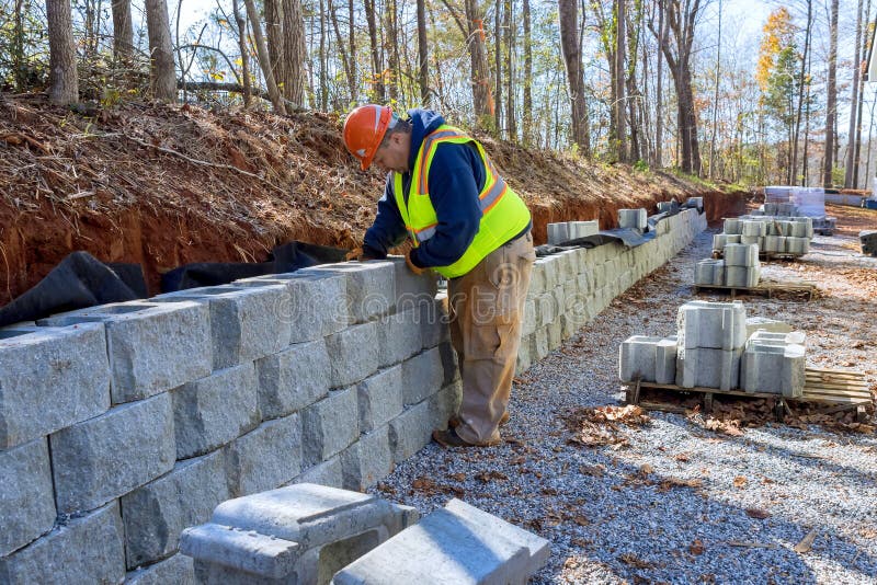 Cement Blocks are Being Used by Construction Worker To Build a ...