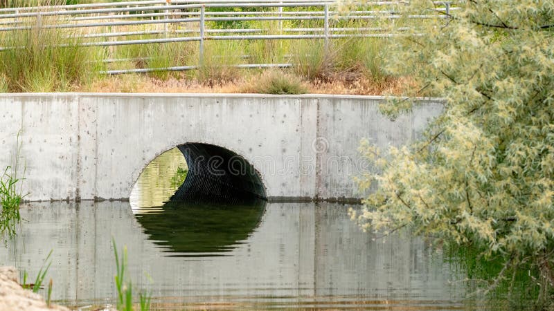 Cement Bridge with Culvert on Irrigation Ditch Stock Image - Image of ...