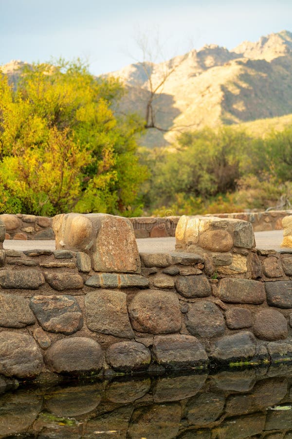 Cement Bridge Made of Stones and Rocks with Small Pond in Front and ...