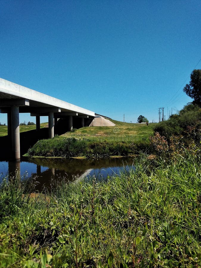 Cement Bridge on the Road stock image. Image of bridge - 294088319
