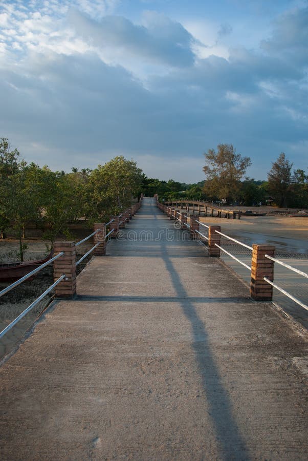 Cement bridge to the sea stock photo. Image of port, clouds - 51309264