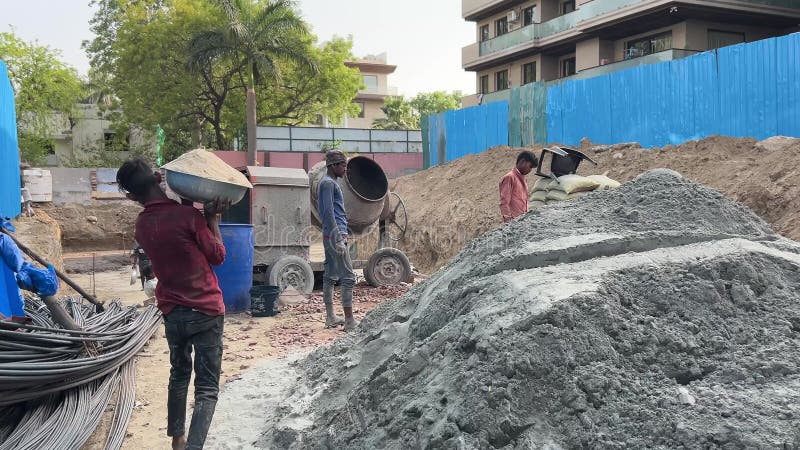 Cement and Constructing the Base, Construction Site Workers are ...