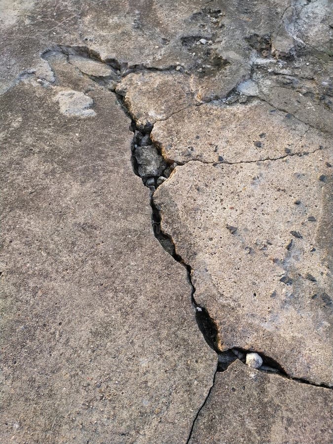 Cement cracks in the yard. stock photo. Image of sharp - 279559522