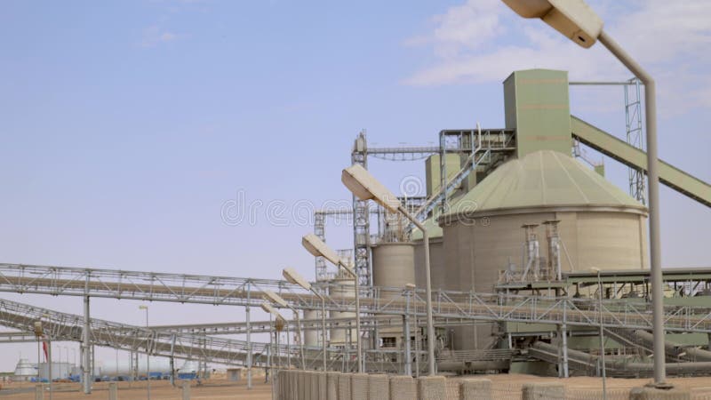 Cement Plant with High Factory Structure and Tower Crane at Industrial ...