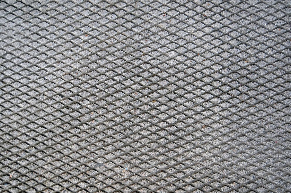 Cement Grid Indent on Asphalt Stock Photo - Image of rough, indentation ...