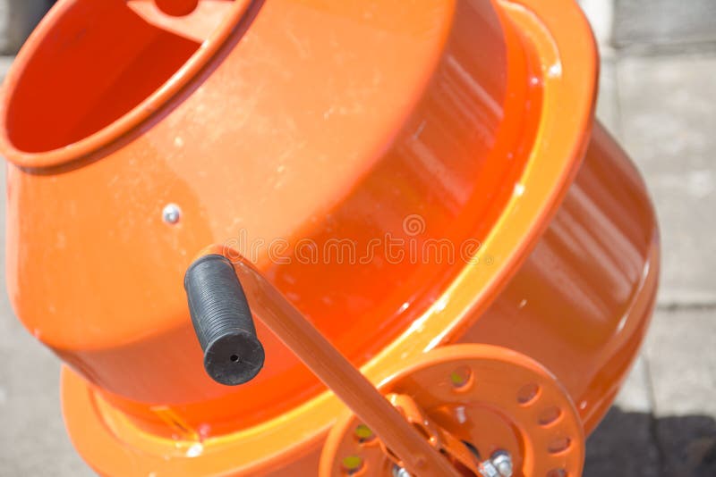 Cement Mixer Machine is at Construction Site. Orange Concrete Mixer at ...