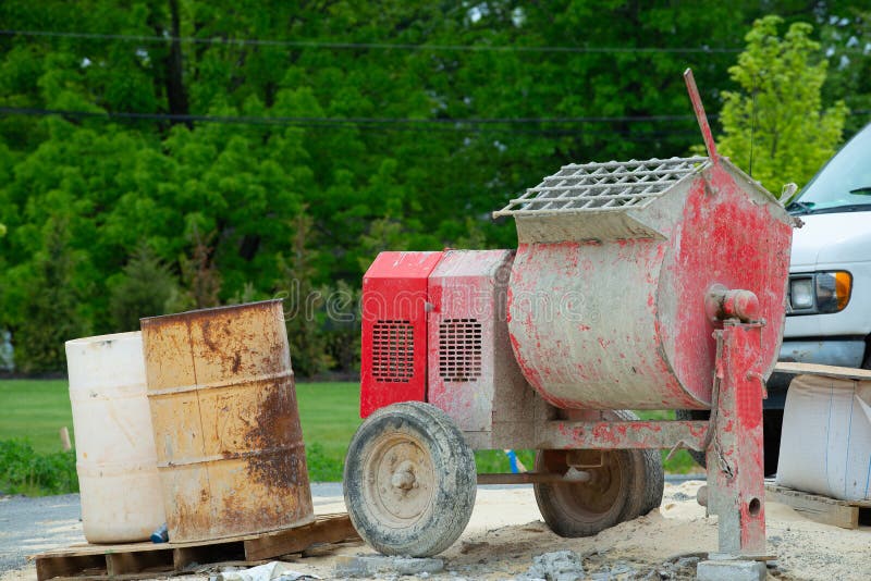 Cement Mixer Machine at Construction Site, Tools and Sand Stock Image ...