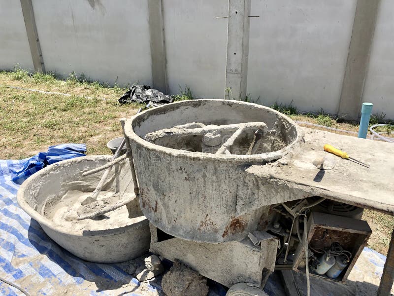 Cement mixing equipment stock photo. Image of metal - 186935174