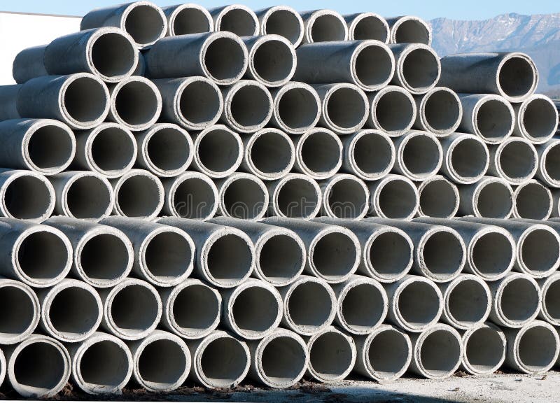 Cement pipes in pile stock image. Image of sunshine, building - 17389947