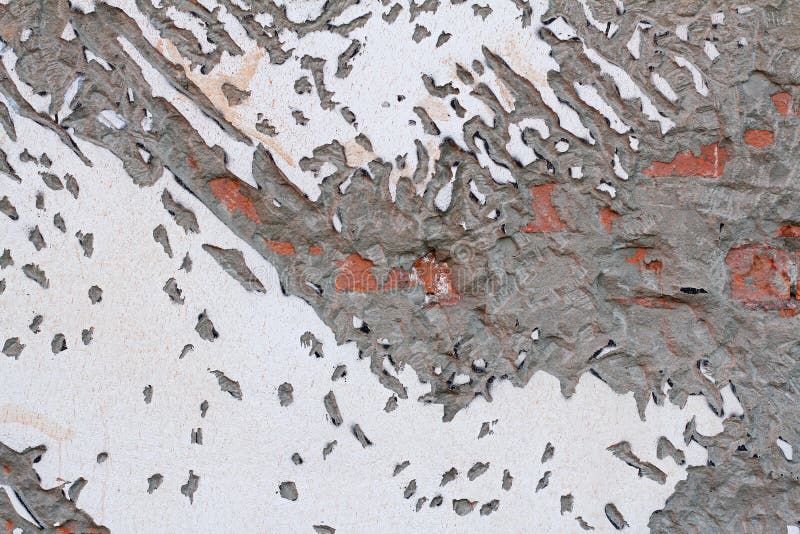 Cement Plaster Destroyed by a Chisel on a Brick Wall Stock Photo ...