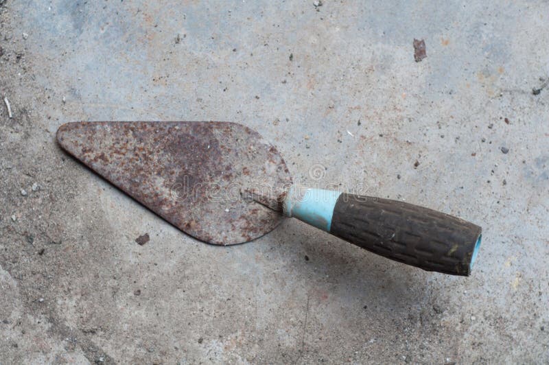 Cement Spoon on Gray Abstract Textured Cement Background. Stock Image ...