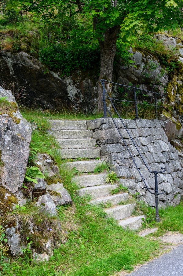 Cement Stairs Leading Up a Stone and Grass Hill, Path To Adventure ...