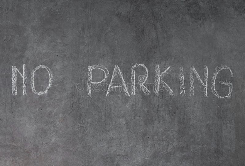 Cement Wall with No Parking Sign Written in Chalk Stock Image - Image ...