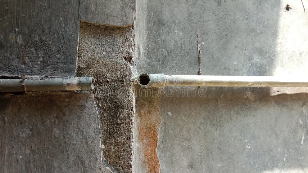 Cement Wall with Water Pipe Stock Photo - Image of cladding, pipes ...