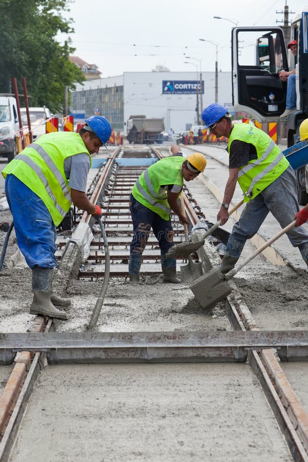 Cement workers editorial stock image. Image of people - 55277704