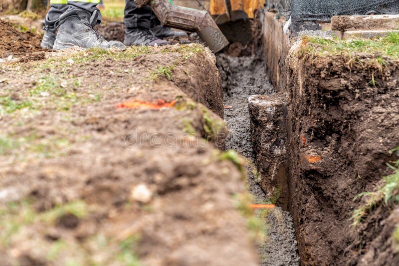 Cementing the Foundation in the Ground when Building a House Stock ...