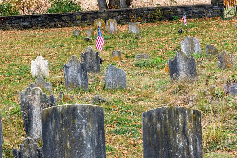 Cemetery, Featuring a Grassy Field with Several Flags Blowing in the ...