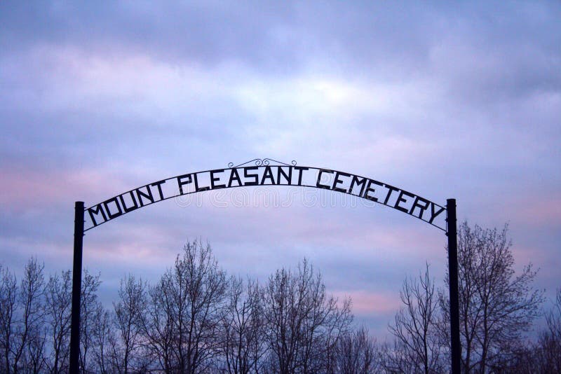 Cemetery Sign Wrought Iron Arch Pink Blue Sunset Stock Photo - Image of ...