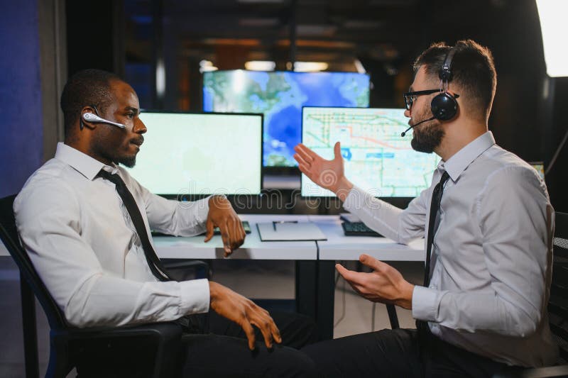 Center of Dispatching Maintenance. Portrait of Men Working Via Headset ...