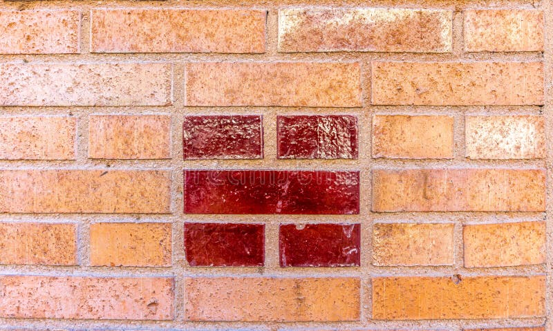 Centered Red Glazed Bricks on Orange Brick-wall Stock Image - Image of ...