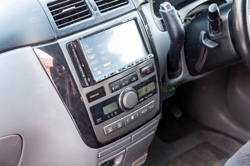 The Central Control Console on the Panel Inside the Car Close-up with ...