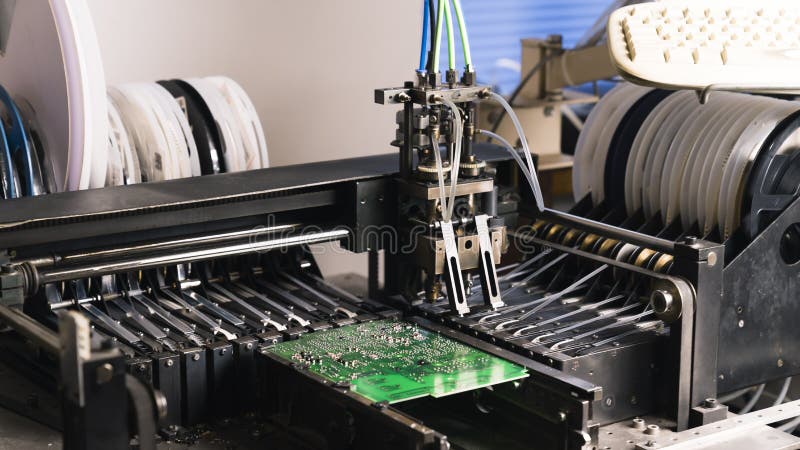 The Central Part of SMD Montage Machine during Work. Connecting ... The Central Part of SMD Montage Machine during Work. Connecting ...