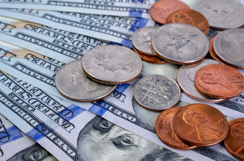 Cents of Different Denominations on Top of Hundred Dollar Bill. Stock ...