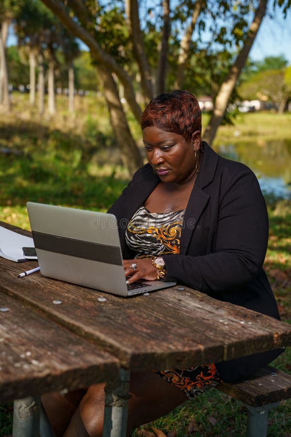 CEO Businesswoman Typing on Her Laptop Computer while Working Remote ...