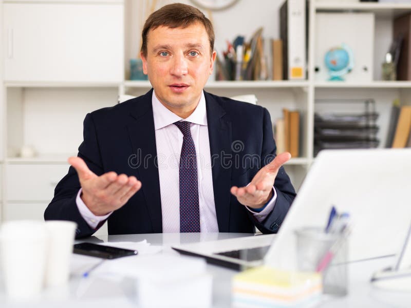 CEO Discussing Financial Report in Office Stock Photo - Image of firm ...