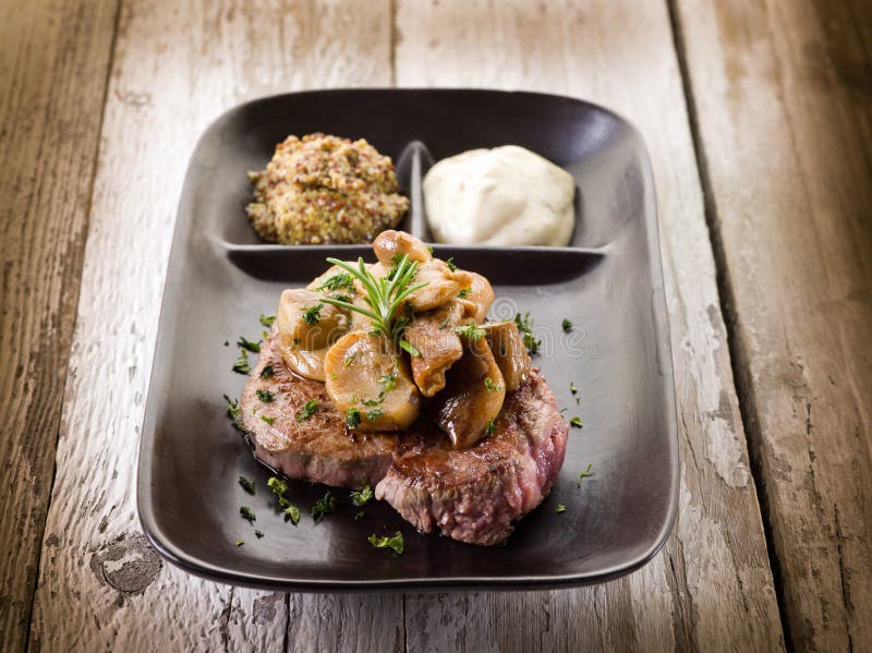 Cep Mushroom Over Tenderloin Stock Photo - Image of grilled, food: 22599876