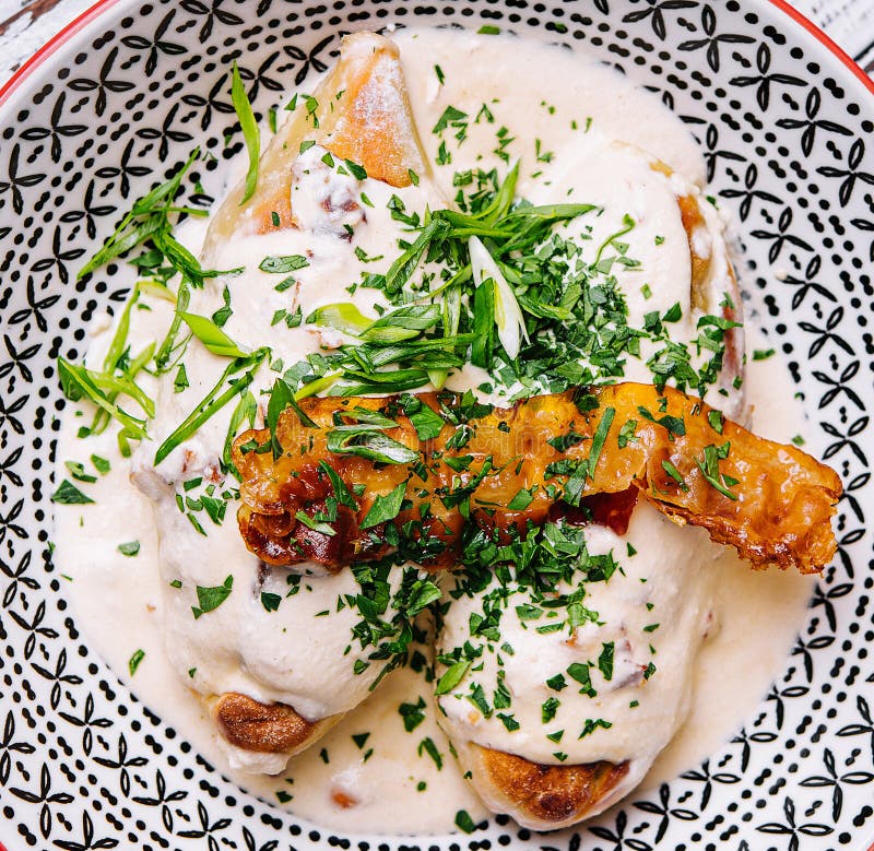 Cepelins or Zeppelins with Pork and Pancetta Cracklings Stock Photo ...