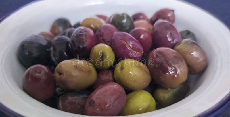 Ceramic Bowl Filled with Cut Pickled Olives Stock Photo - Image of ...