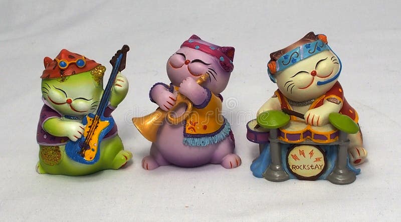 Ceramic Cats Playing Instruments Stock Photo - Image of green, playing ...